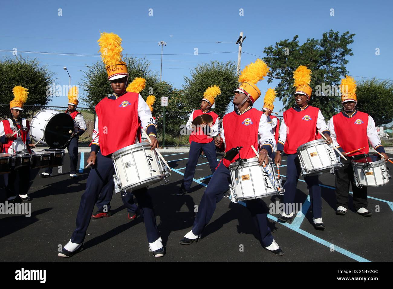 The Marching Cobras of New York perform before a ribbon cutting to ...