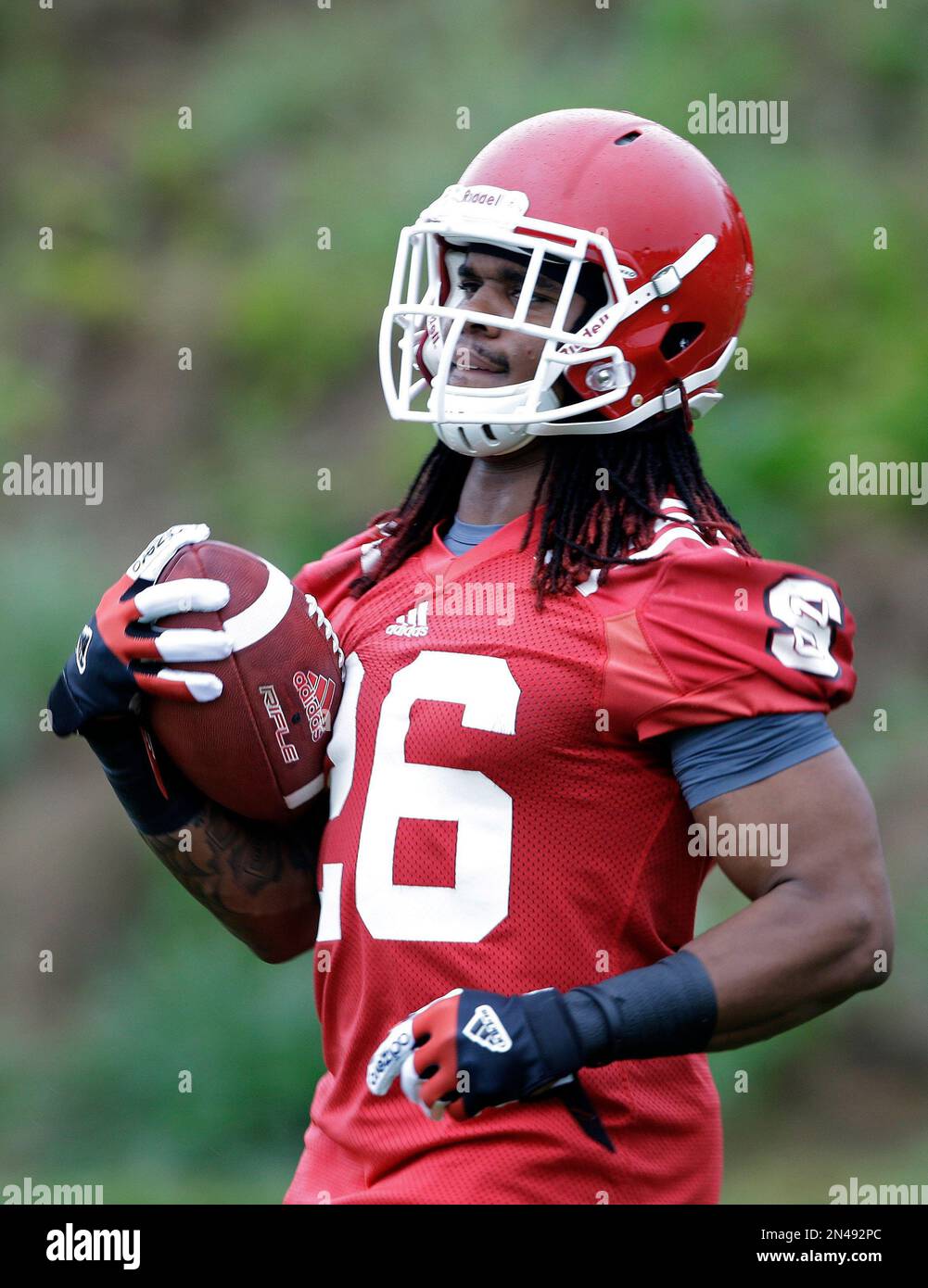 In this photo taken Saturday, Aug. 2, 2014 North Carolina State running ...