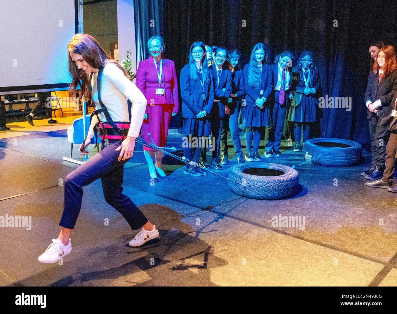 The Princess of Wales, pull tyres behind her, during a visit to Landau ...