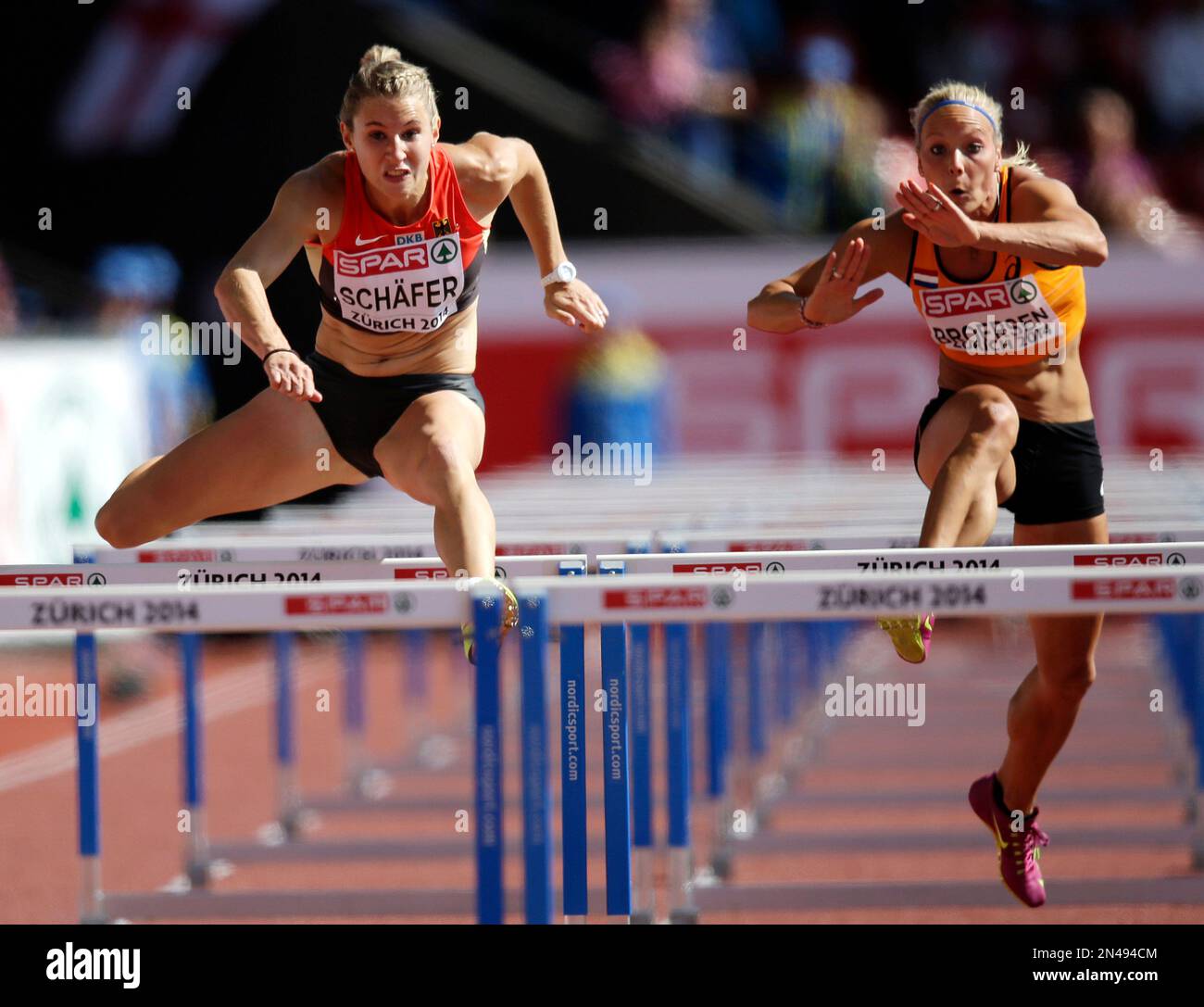 Germany's Carolin Schaefer, left, and Netherlands' Nadine Broersen run ...