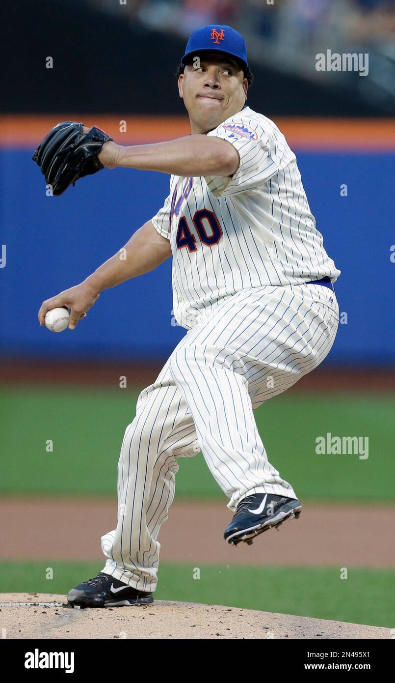 New York Mets' Bartolo Colon (40) delivers a pitch during the first ...