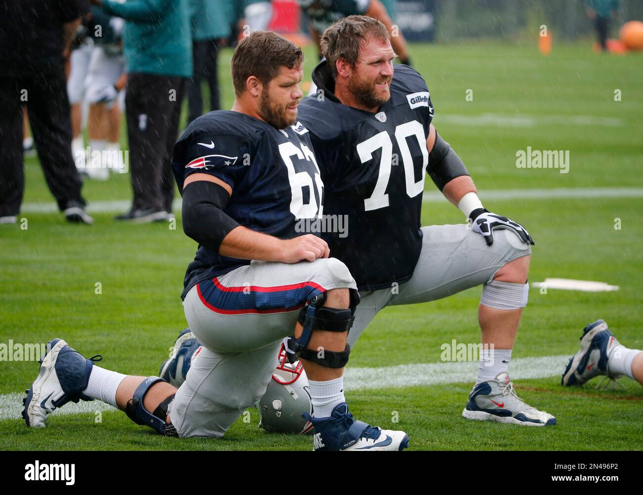 New England Patriots center Ryan Wendell (62) and guard Logan Mankins ...