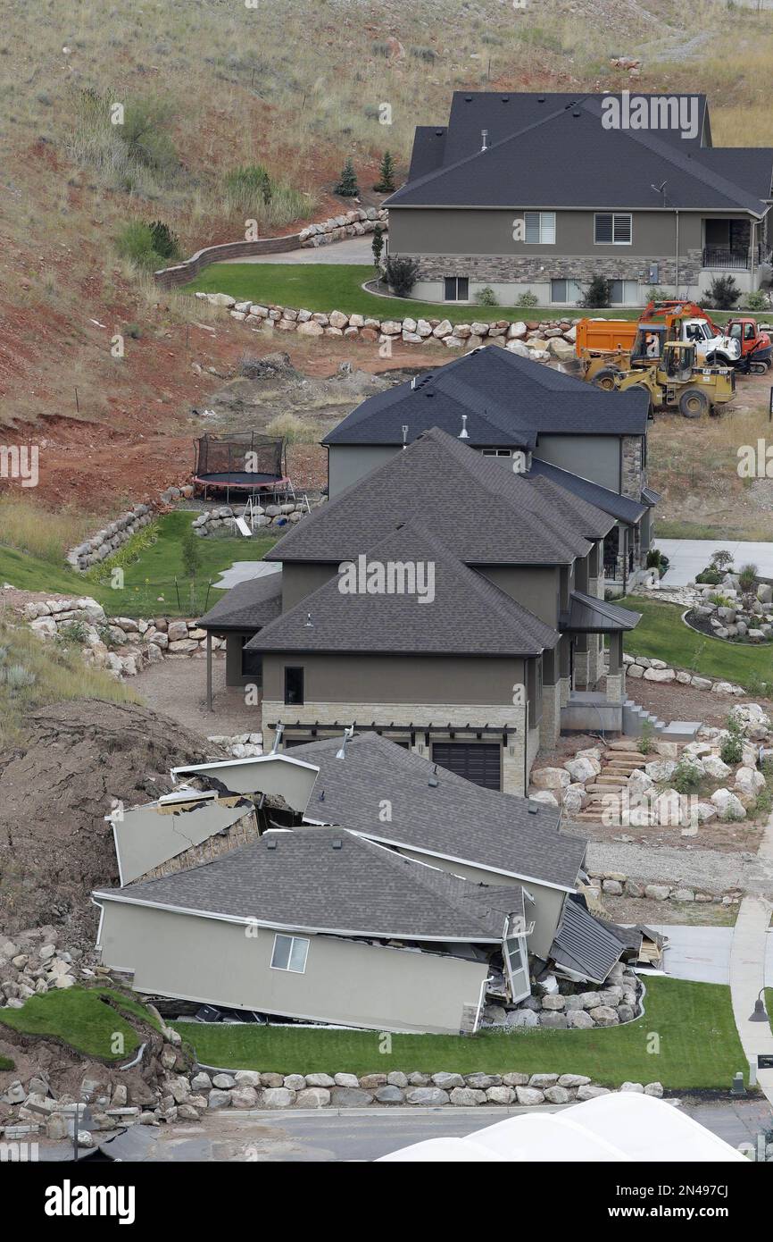 FILE - This Aug. 5, 2014 file photo shows a home destroyed by a ...