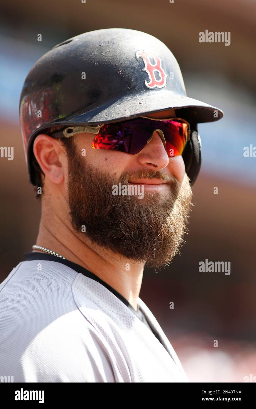 Boston Red Sox first baseman Mike Napoli prepares in the dugout at the ...
