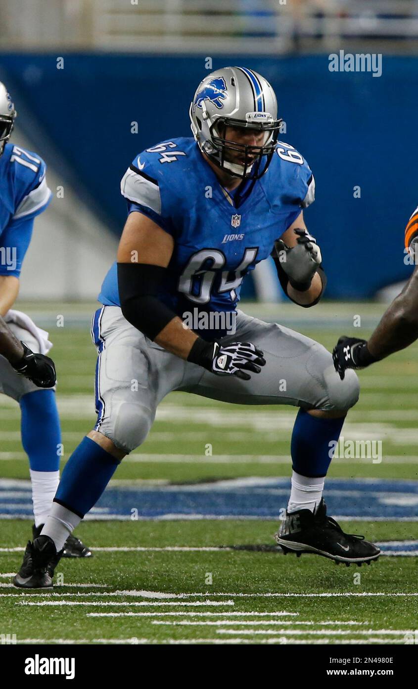 Detroit Lions center Travis Swanson (64) prepares to block against the ...