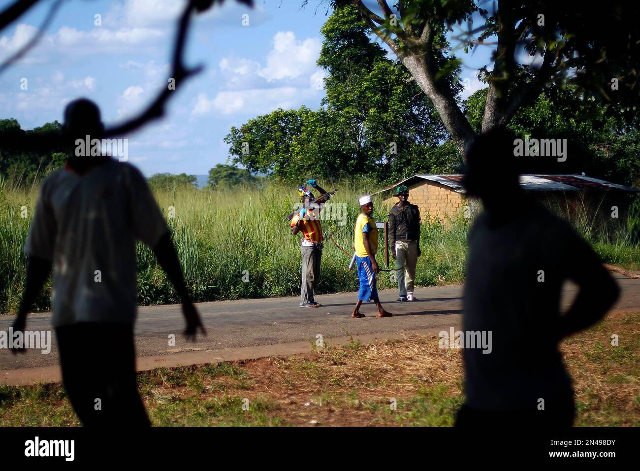 Armed anti-balaka militiamen man a checkpoint some 60 kms north of ...