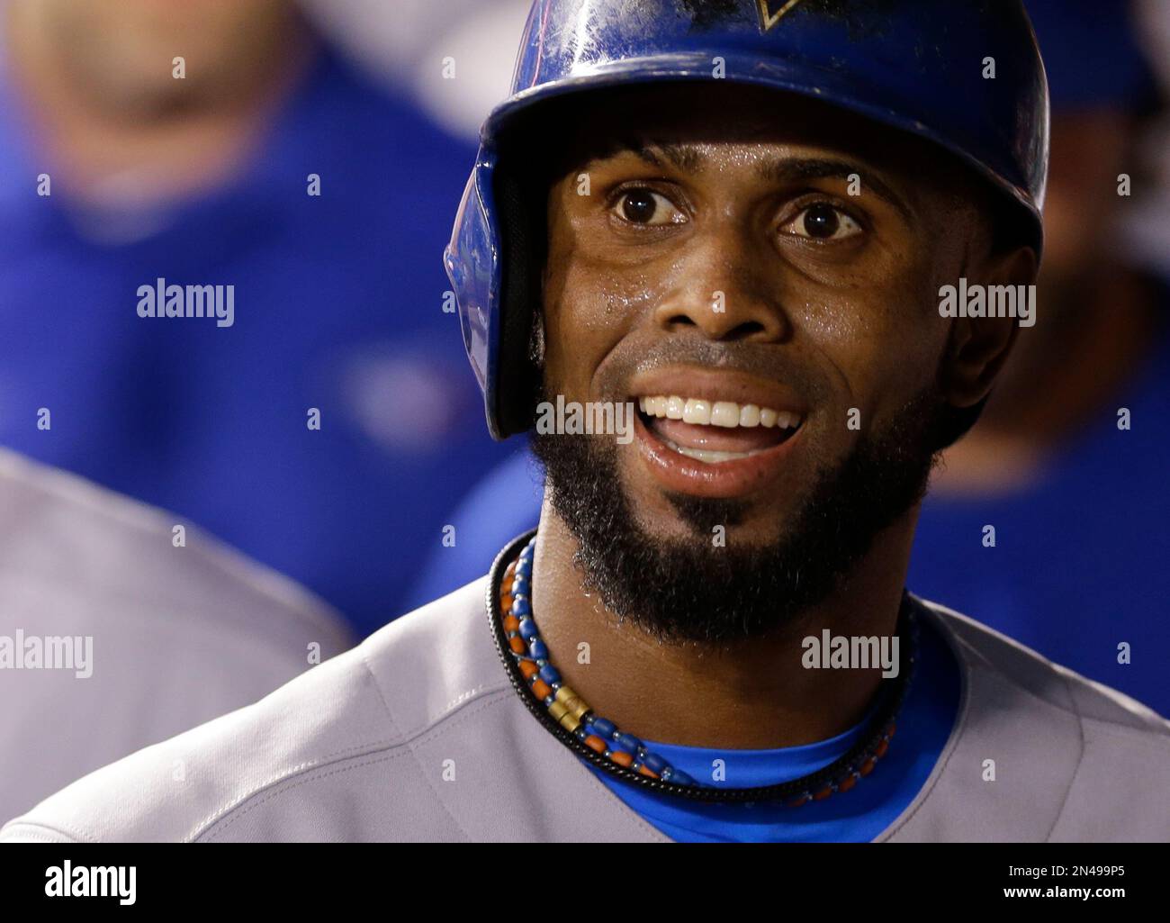 Toronto Blue Jays' Jose Reyes smiles in the dugout during a baseball ...