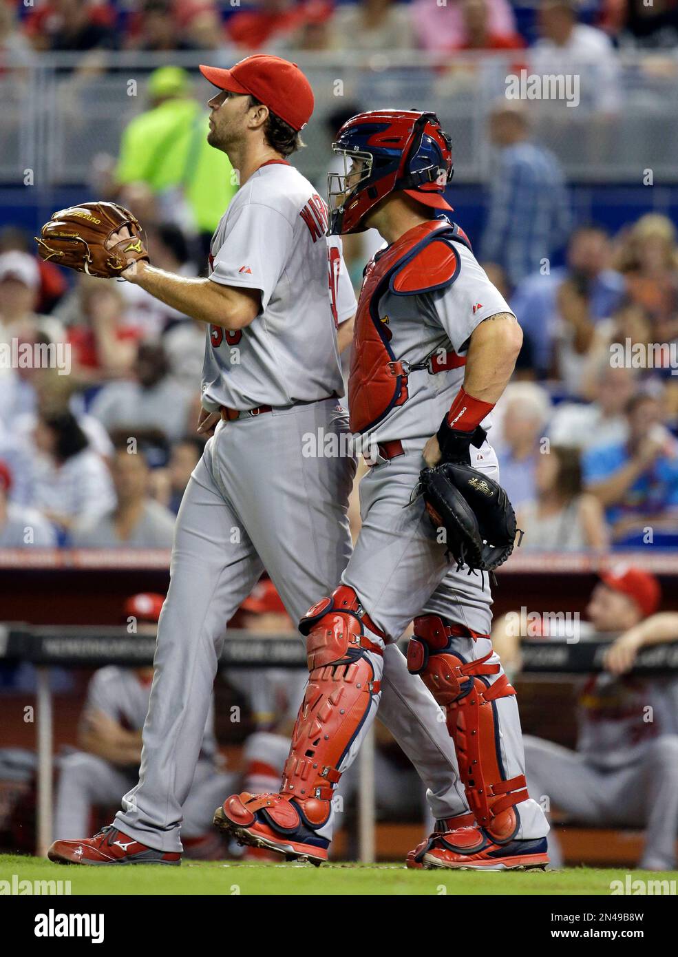 St. Louis Cardinals catcher Tony Cruz, right, talks with starting ...