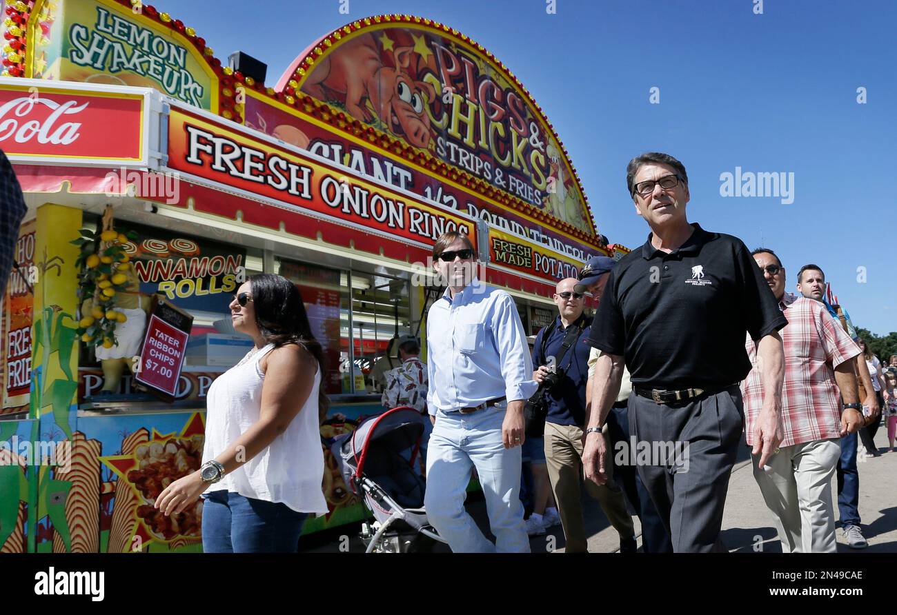 Texas Gov. Rick Perry walks on the main concourse before speaking at ...