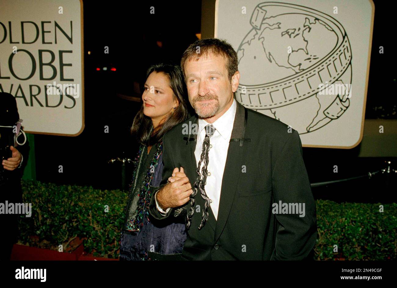 Actor and comedian Robin Williams and his wife Marsha Garces, arrive at ...