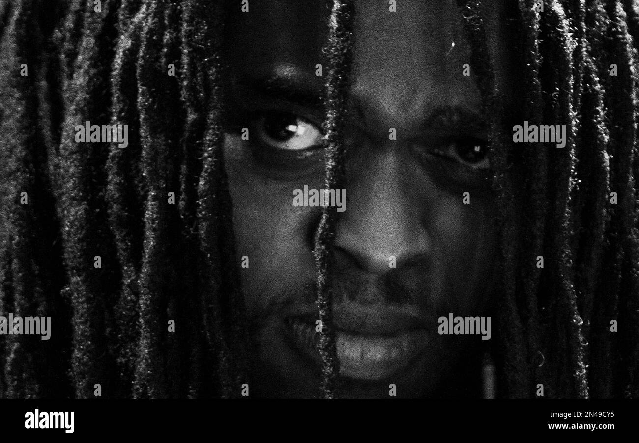 Mwanzi Harriott on guitar performs with Yessai Karapetian band during ...