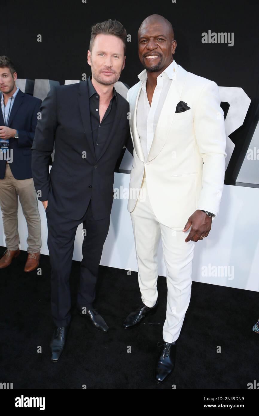 Composer Brian Tyler, left, and Terry Crews arrive at the Lionsgate Los ...