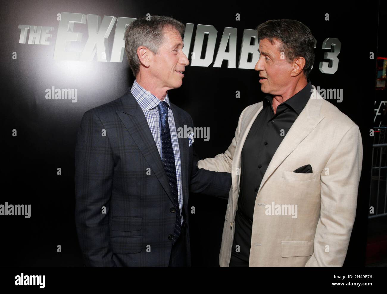 Jon Feltheimer, CEO of Lionsgate, left, and Sylvester Stallone arrive ...