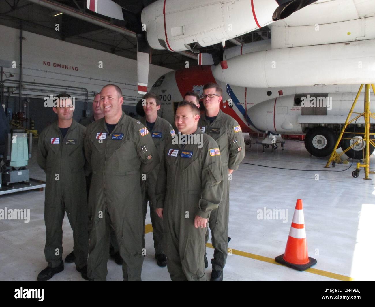 A U.S. Coast Guard crew poses for a photo at the U.S. Coast Guard Air ...