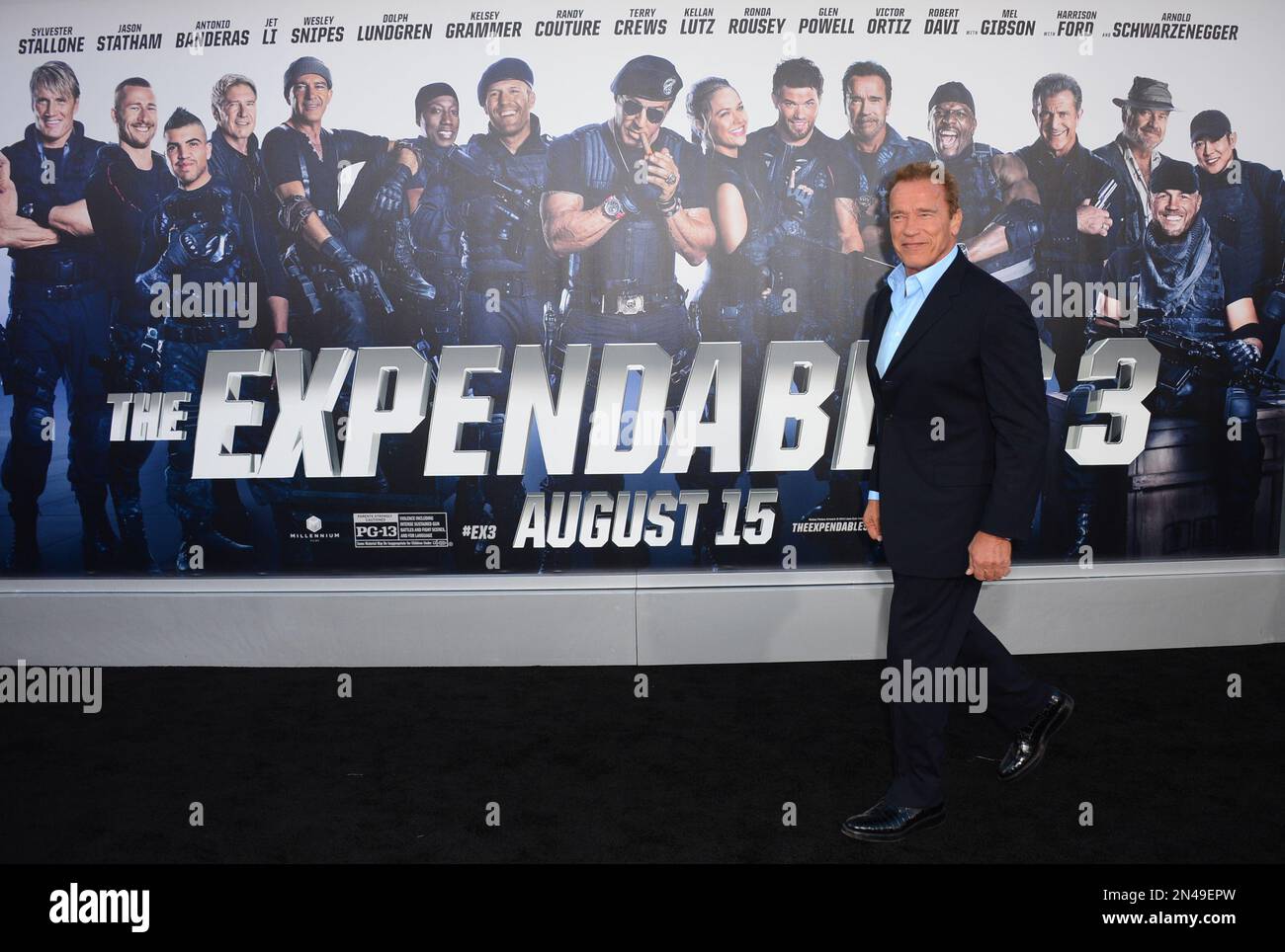 Arnold Schwarzenegger arrives at the premiere of "The Expendables 3" at ...