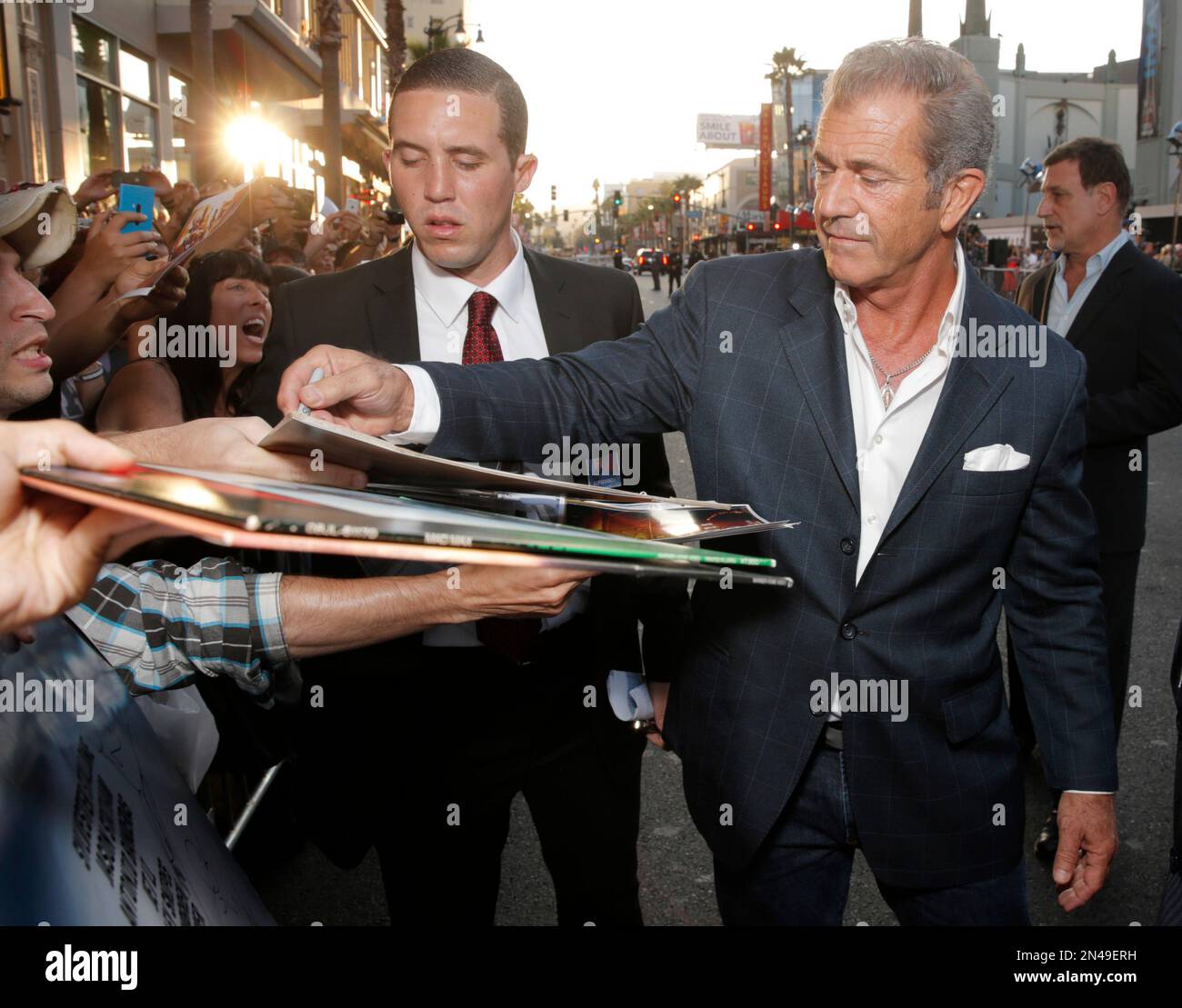 Mel Gibson signs autographs at the Los Angeles premiere of "The ...