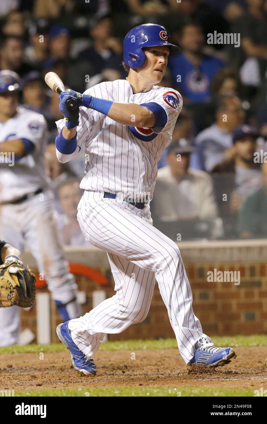 Chicago Cubs' Chris Coghlan watches his RBI double off Milwaukee ...