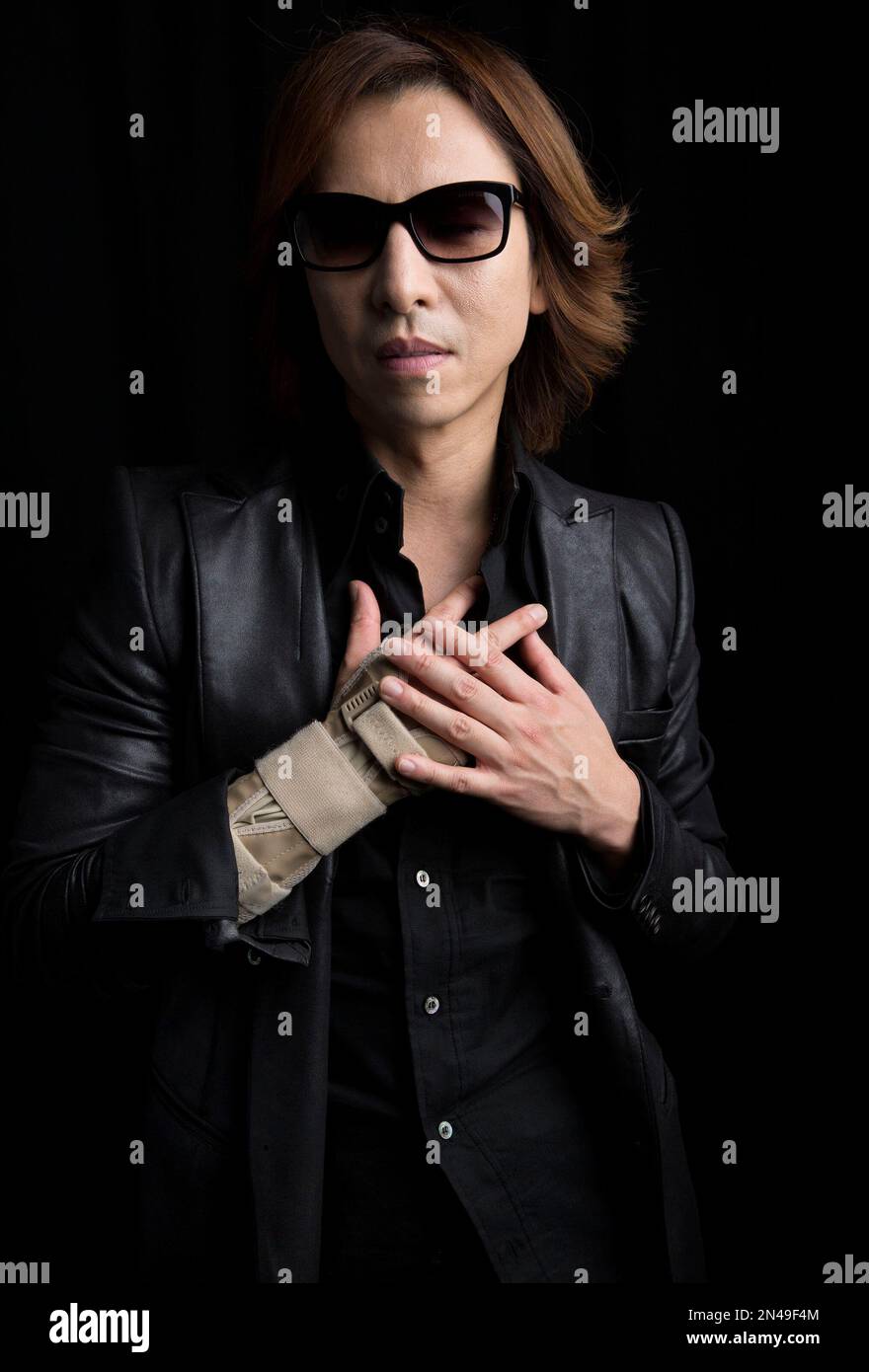 Lead singer of the Japanese heavy metal band X Japan, Toshi poses for a ...