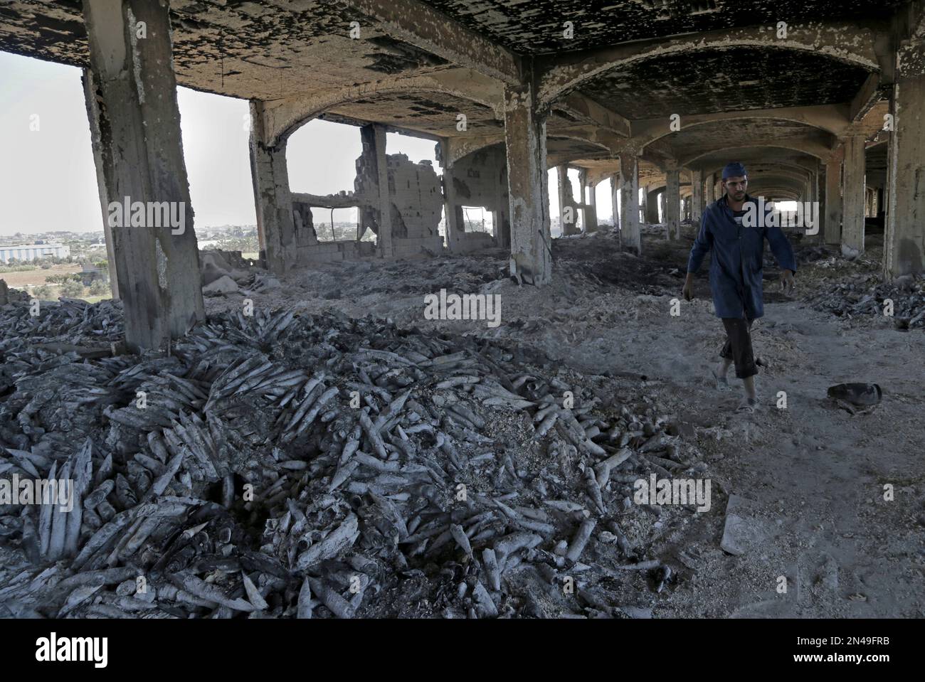 In this Sunday, Aug. 10, 2014 photo, Ahmad Baraka, 25, a Palestinian ...
