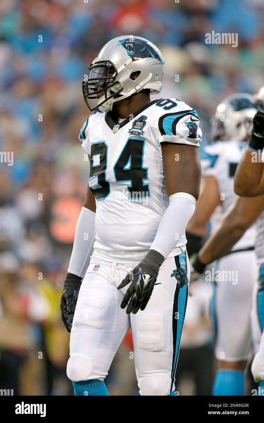 Carolina Panthers' Kony Ealy (94) surveys the Buffalo Bills' offense ...