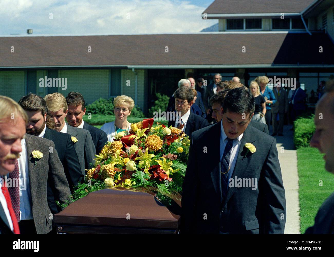 Sherwin and Karen Watkins walk behind the casket carrying the remains ...