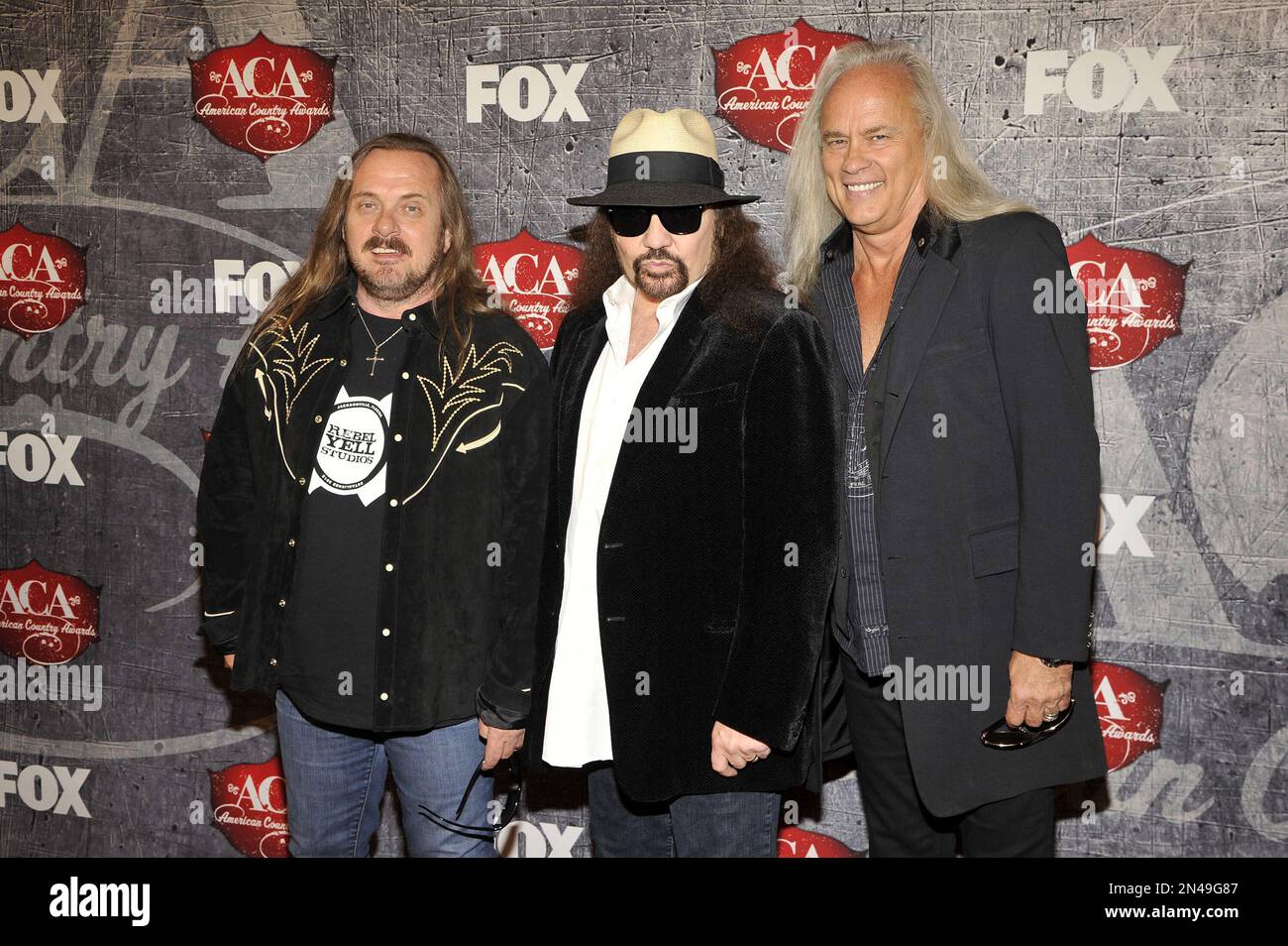 FILE - This Dec. 10, 2012 file photo shows, from left, Johnny Van Zandt, Gary Rossington and ...