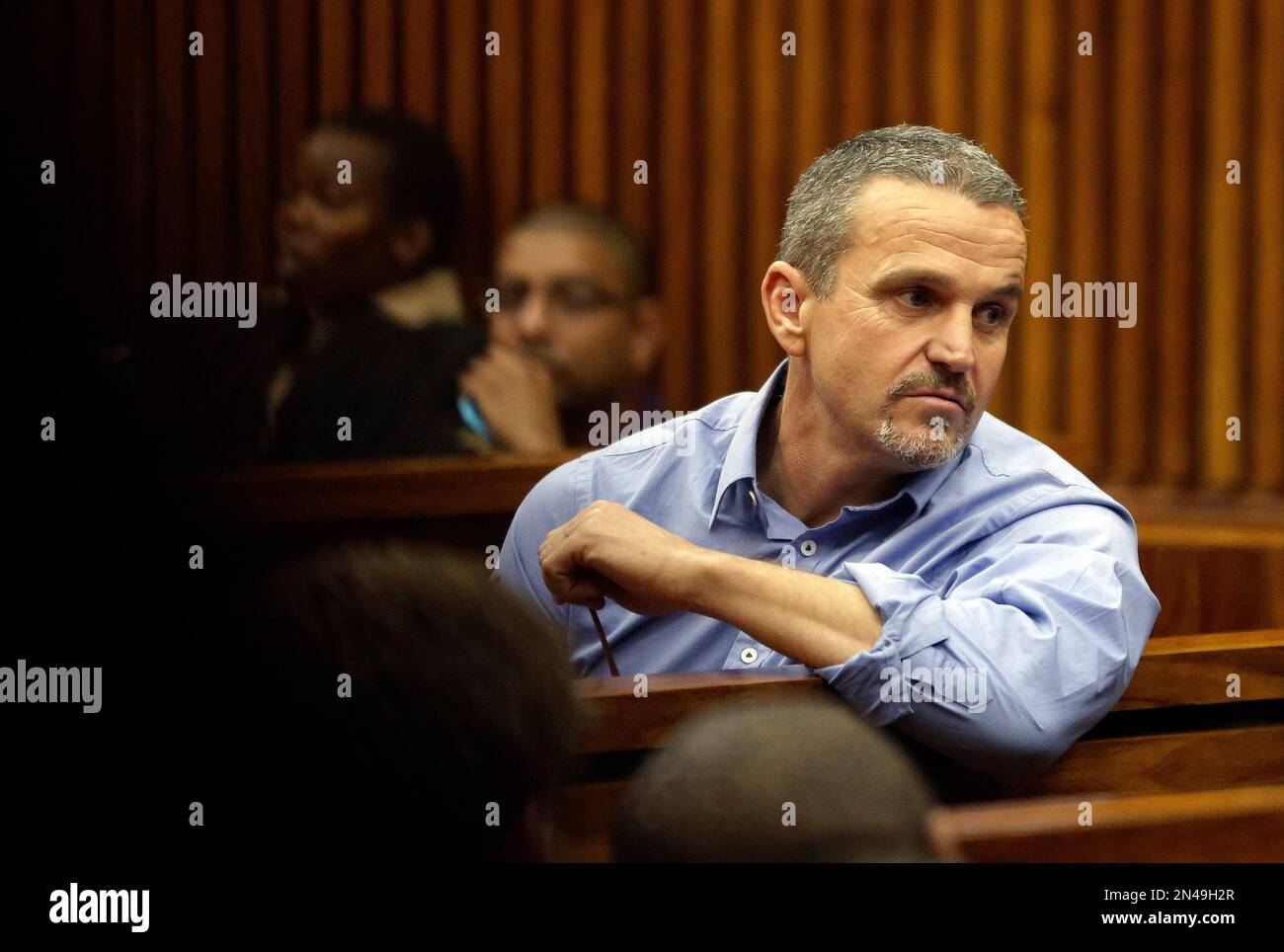 Martin Evans sits in the dock for his extradition hearing at the ...