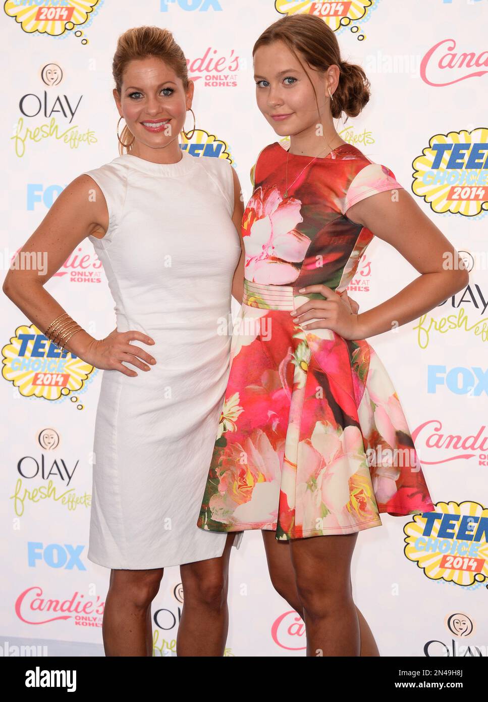Candace Cameron Bure Left And Natasha Valerievna Arrives At The Teen Choice Awards At The