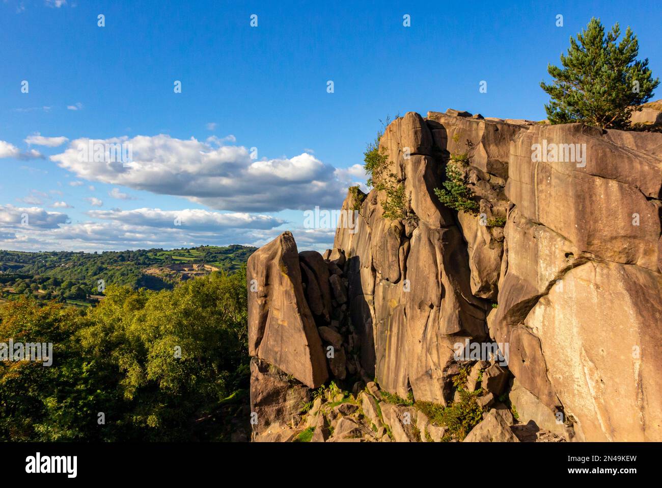 Afternoon sunlight on Black Rocks a small outcrop of natural gritstone ...