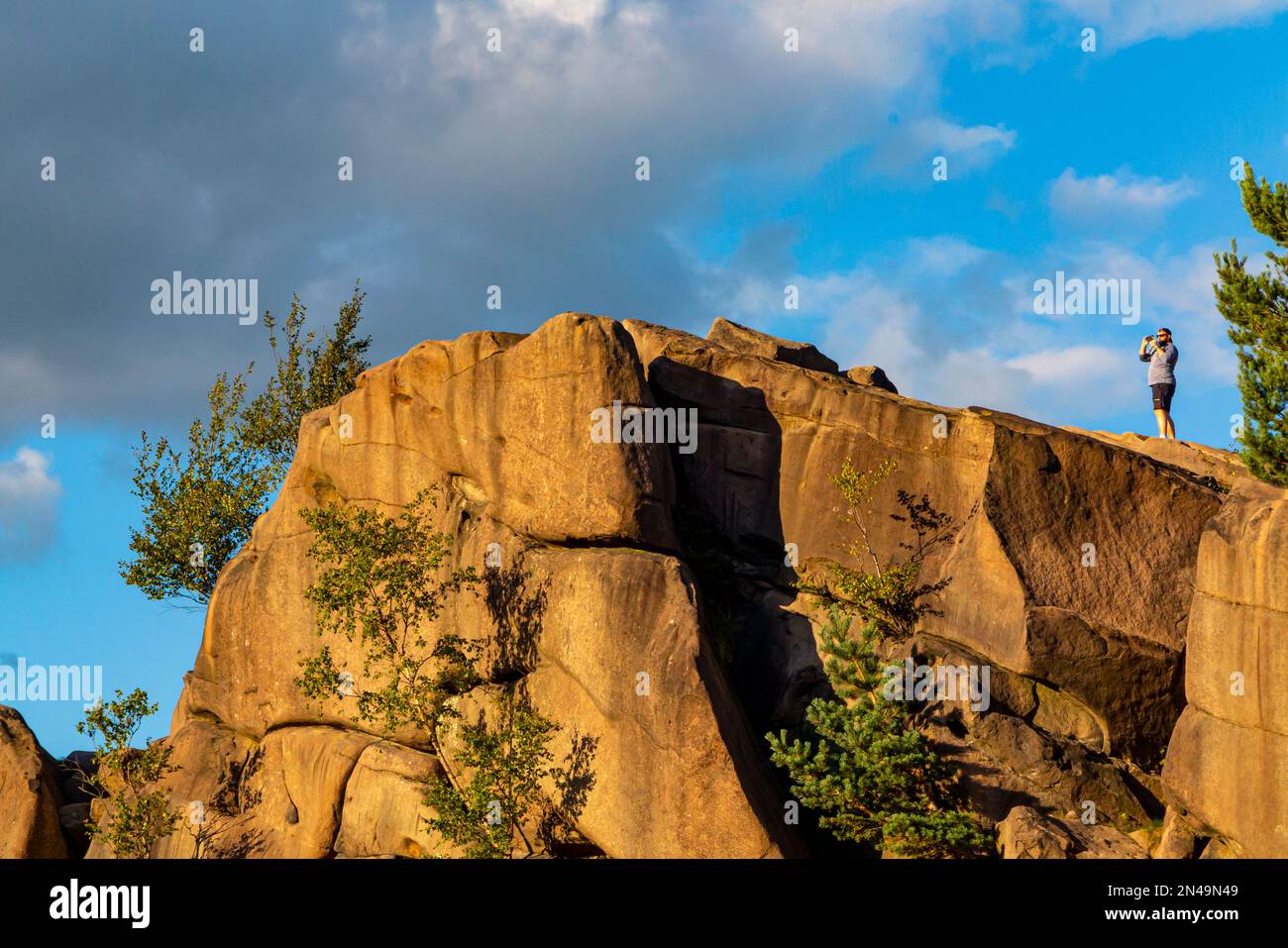 Walker on Black Rocks a small outcrop of natural gritstone, between ...