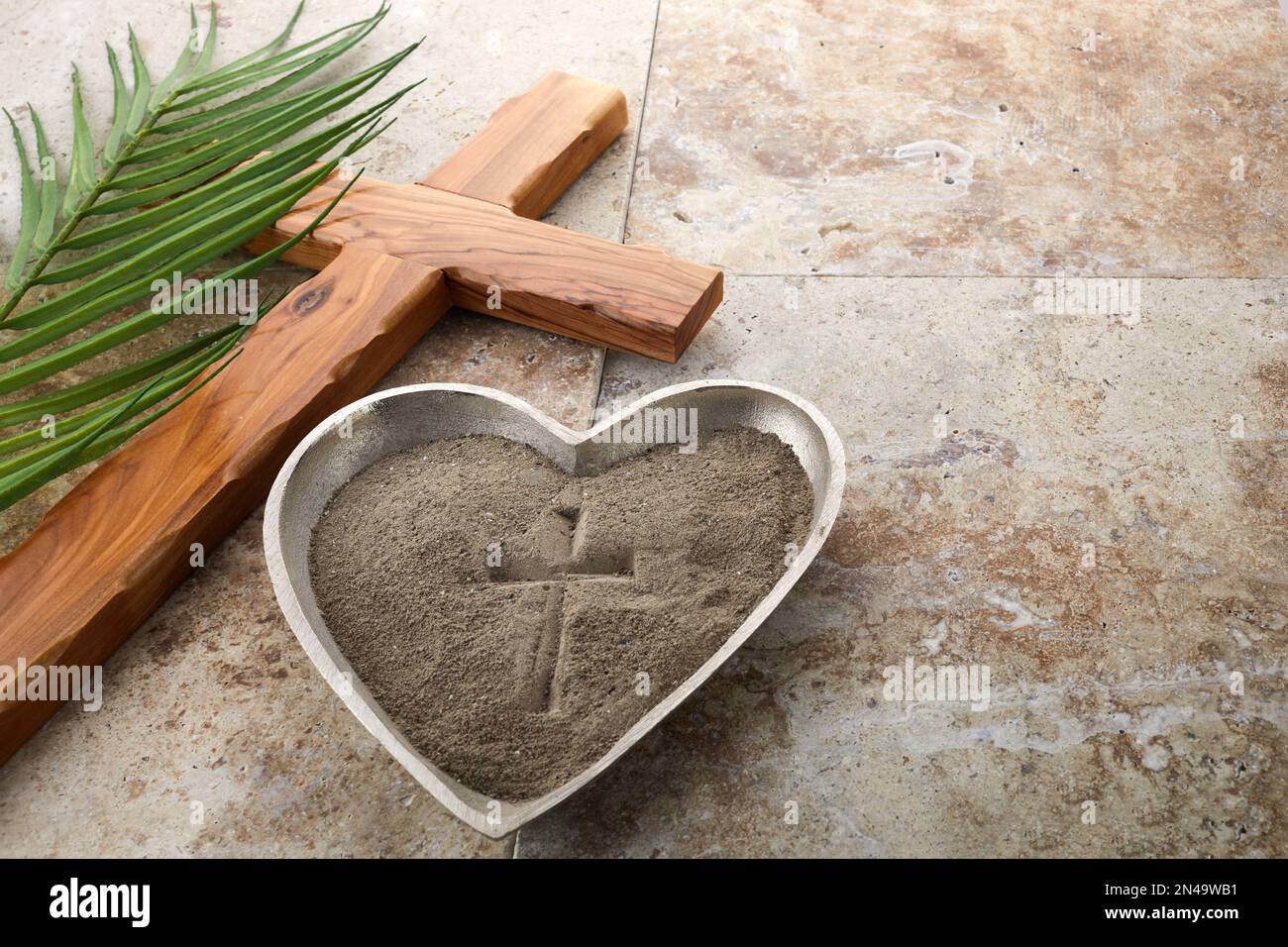 Ash wednesday, crucifix made of ash, dust as christian religion. Lent ...