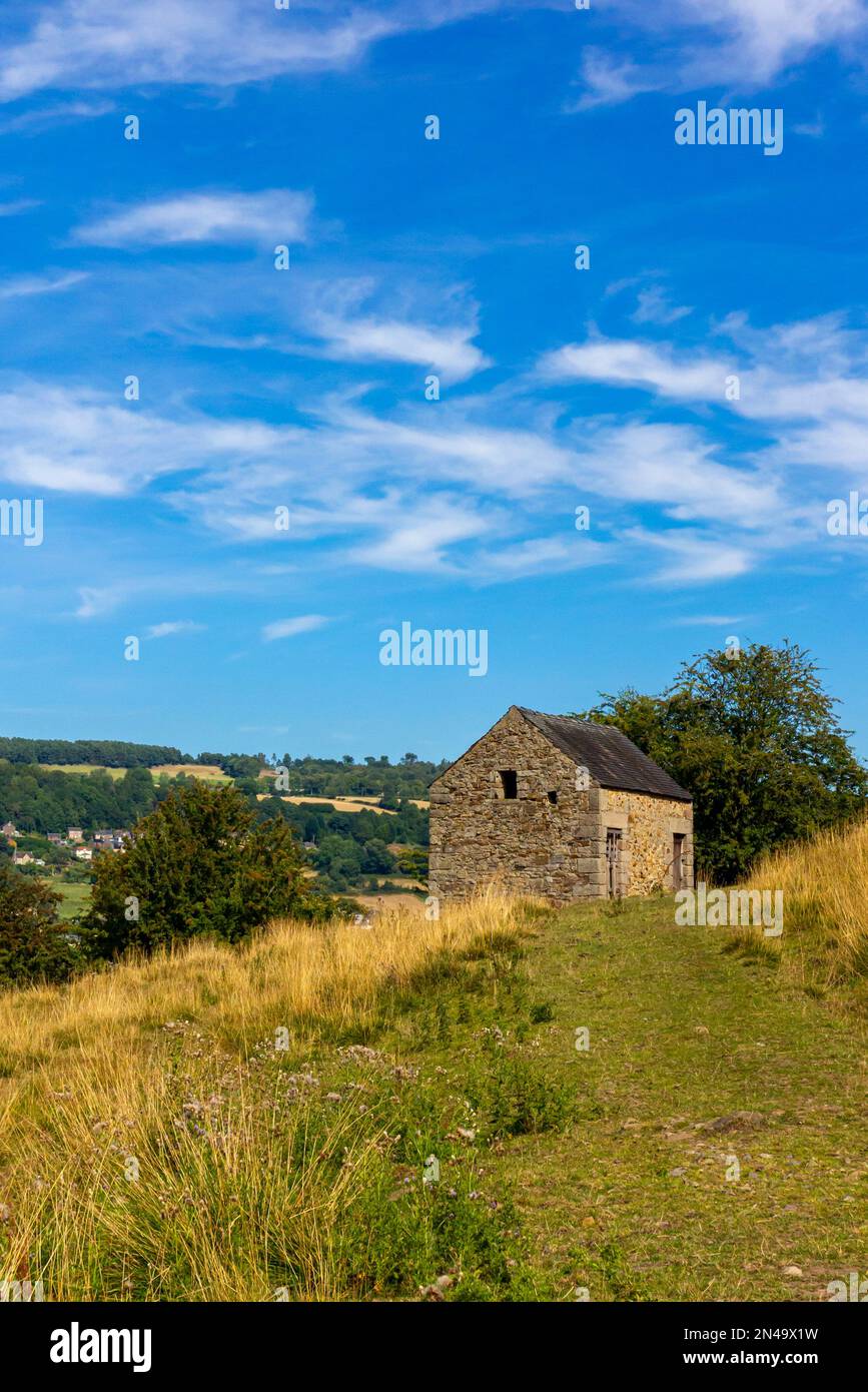 Old stone barn in a field near Oaker in the Derbyshire Dales area of ...