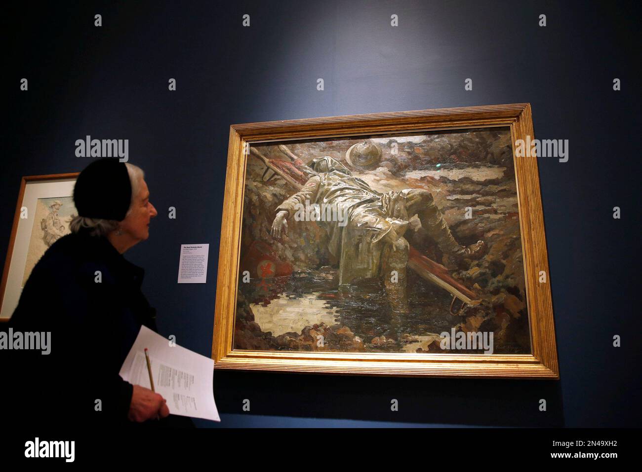 In this Feb. 26, 2014 file photo, a woman views "The Dead Stretcher ...