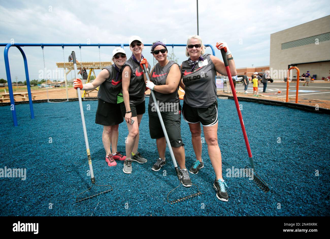 Volunteers are seen at the Nike Plaza Towers Run of Show with Kevin ...