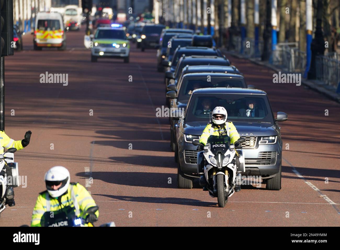 A motorcade carrying Ukrainian President Volodymyr Zelensky travels ...