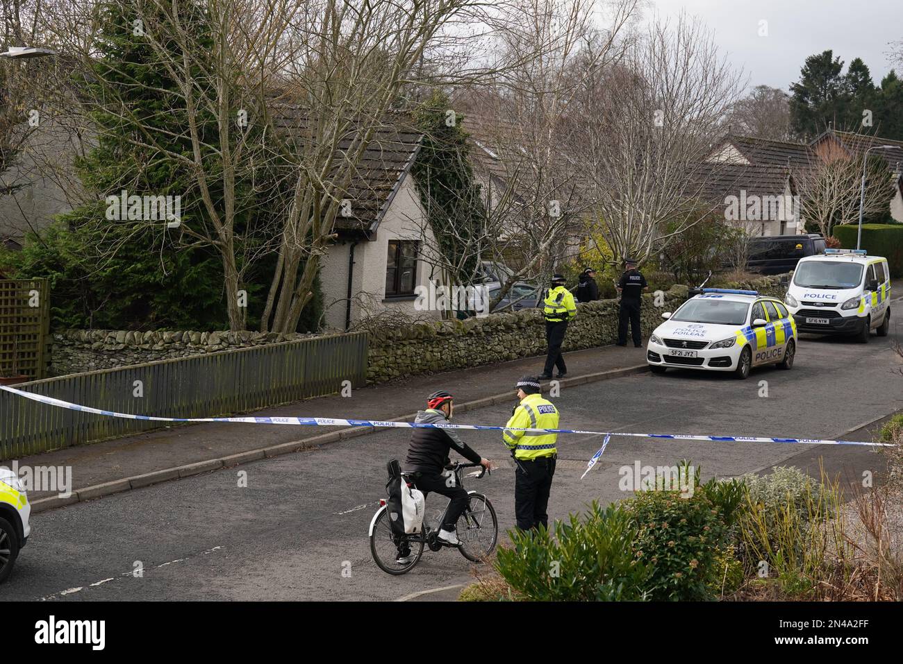 Police officers patrol a cordon in Montgomery Terrace in Gattonside ...