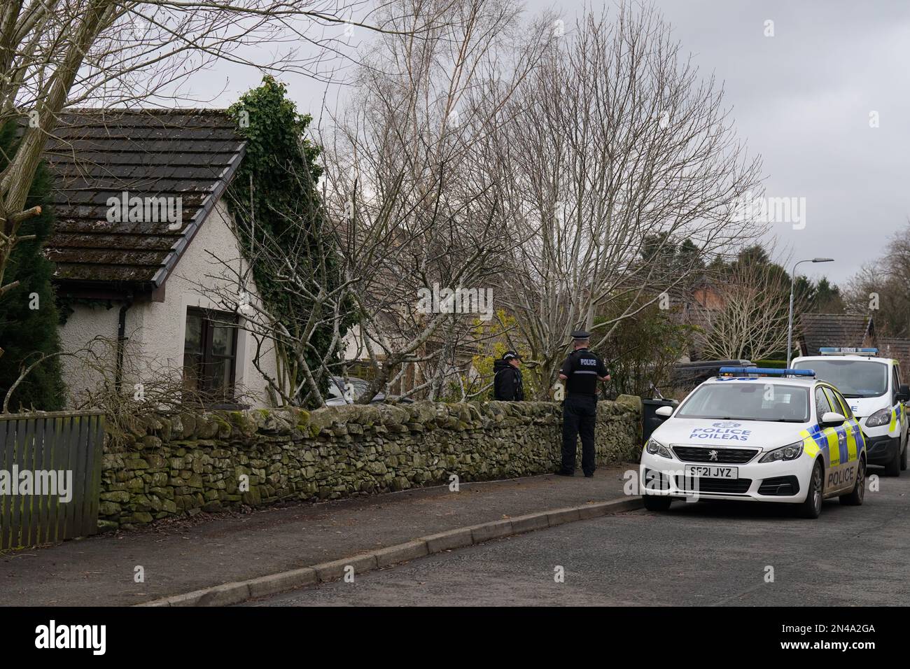 Police officers in the garden of a property on Montgomery Terrace in ...
