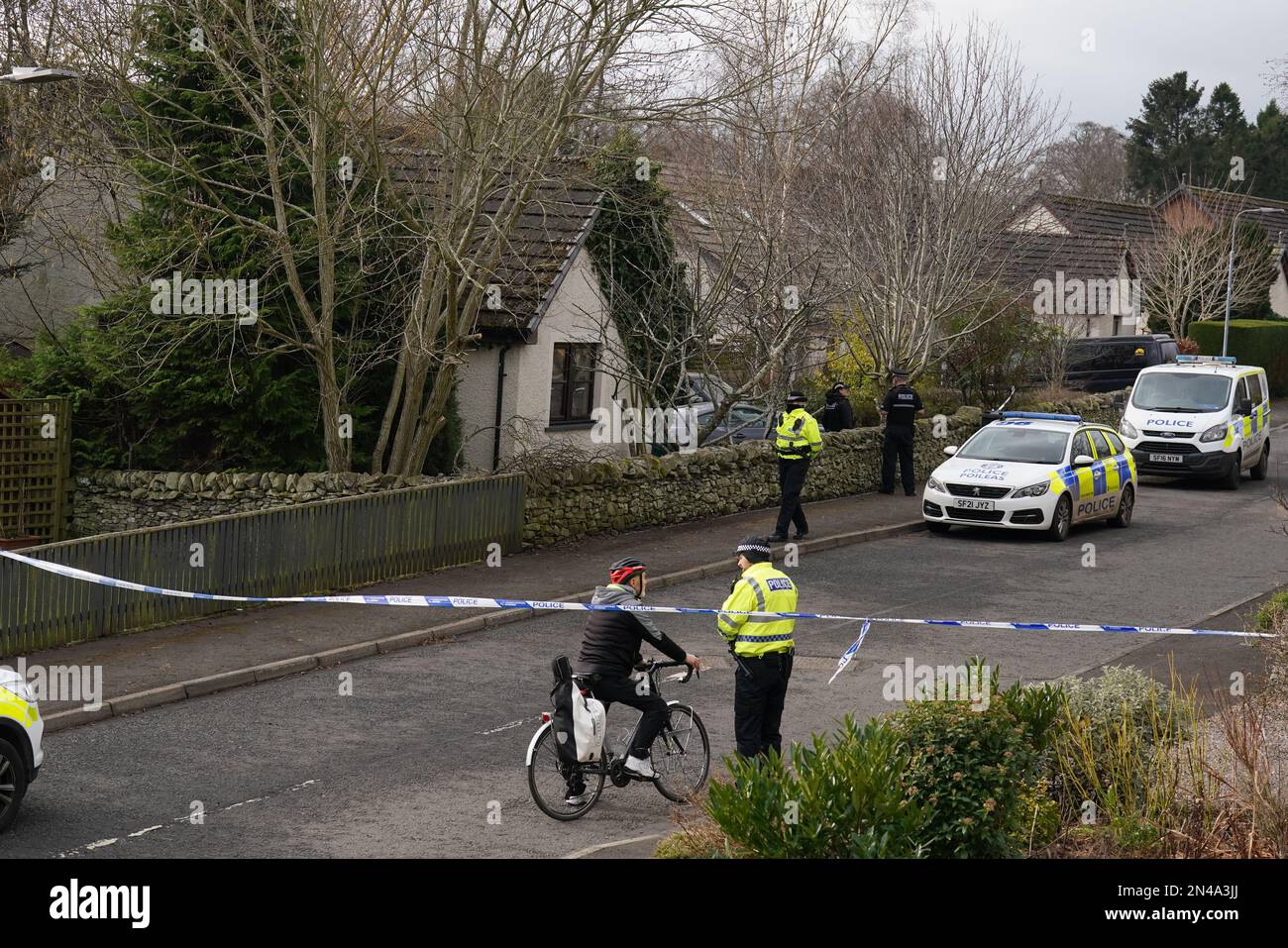Police officers patrol a cordon in Montgomery Terrace in Gattonside ...