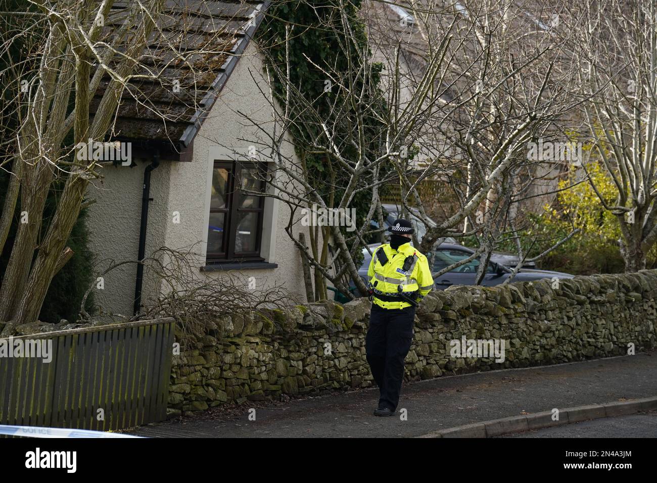 Police officers patrol a cordon in Montgomery Terrace in Gattonside ...
