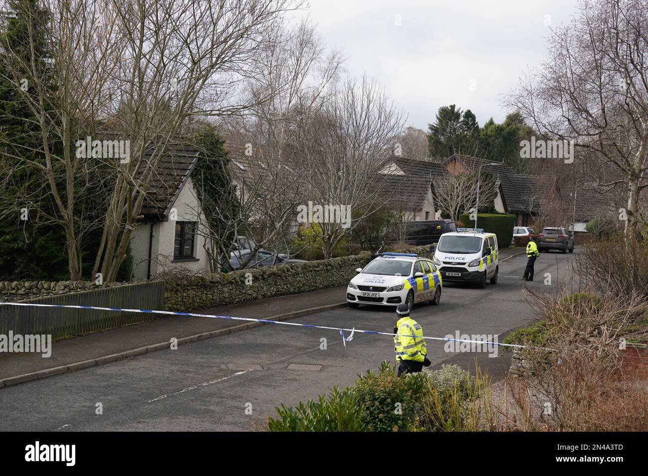 Police officers patrol a cordon in Montgomery Terrace in Gattonside ...