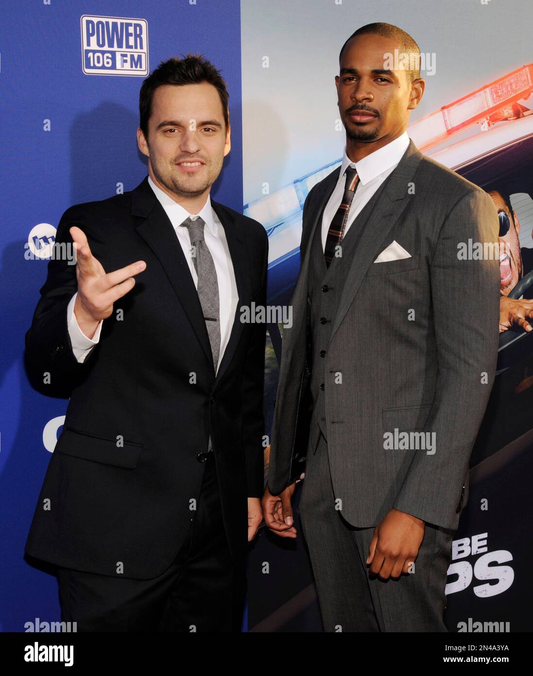 Jake Johnson, left, and Damon Wayans Jr., co-stars of "Let's Be Cops ...