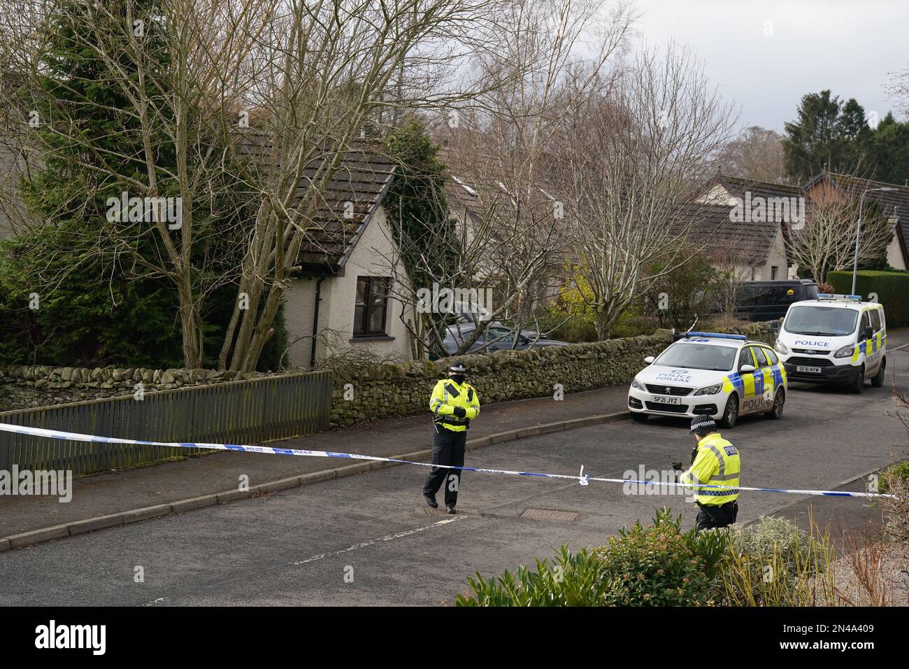 Police officers patrol a cordon in Montgomery Terrace in Gattonside ...