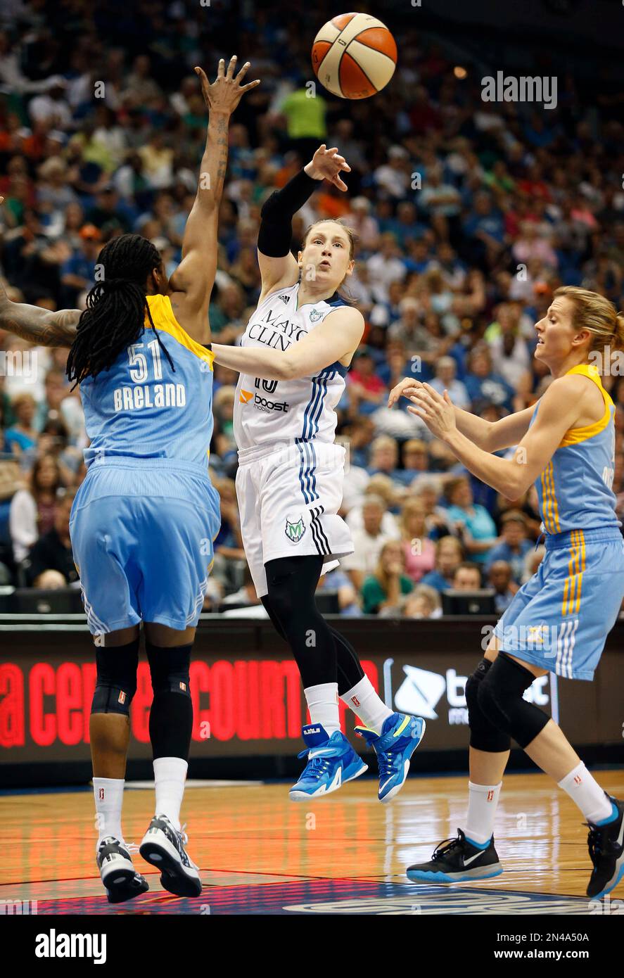 Minnesota Lynx guard Lindsay Whalen (13) passes the ball around Chicago ...