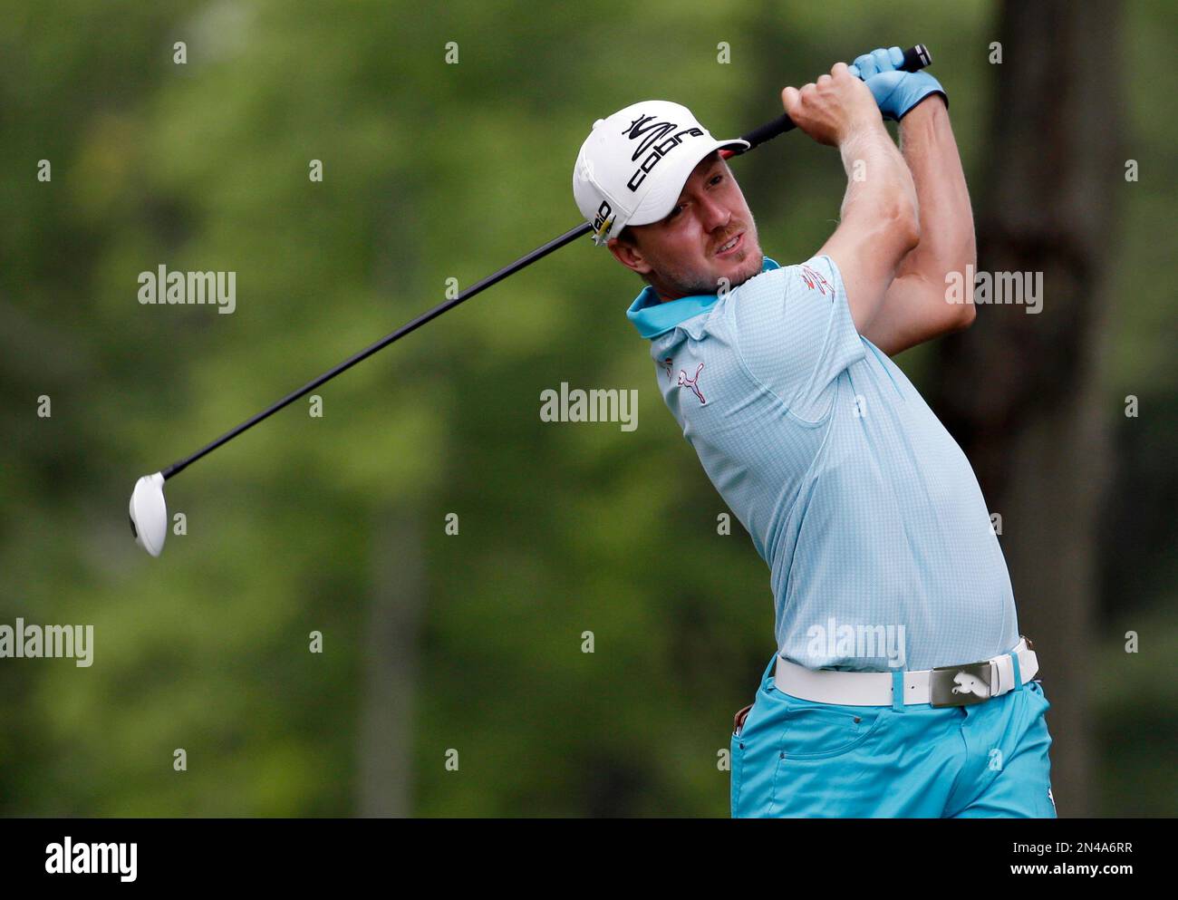 Jonas Blixt, of Sweden, watches his tee shot on the 12th hole during ...
