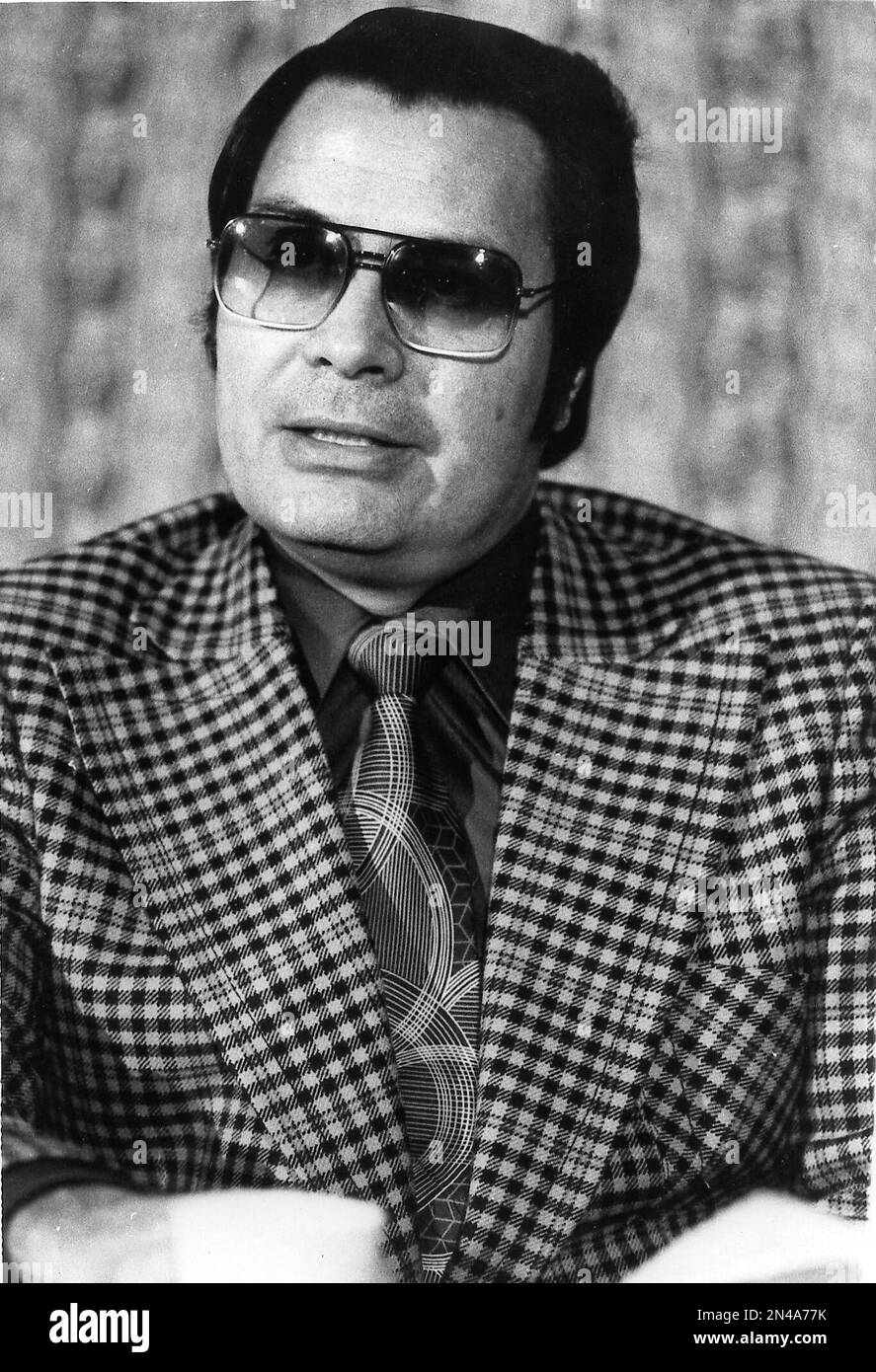 FILE - This Jan. 1976 photo shows the Rev. Jim Jones, pastor of peoples ...