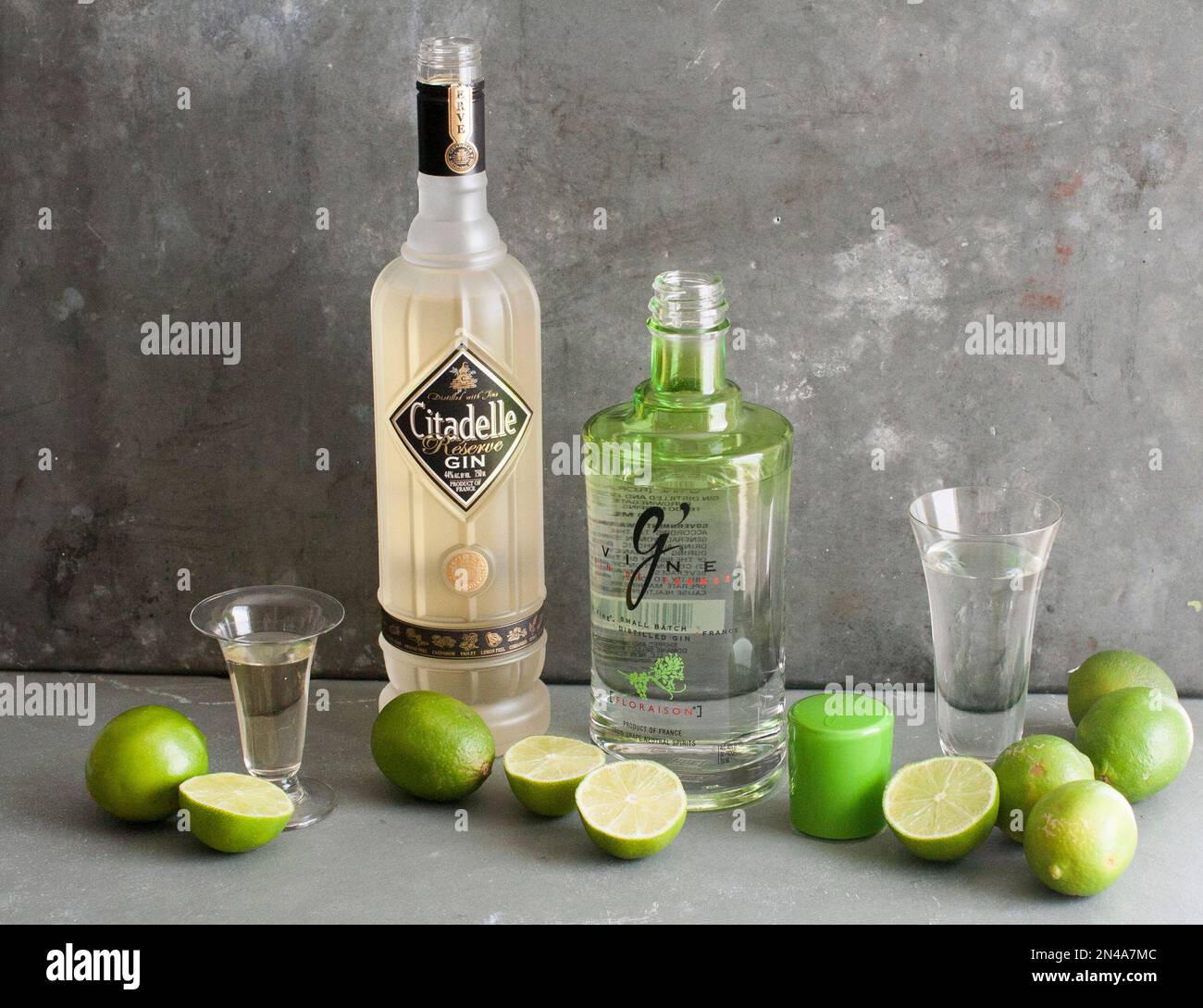 This June 30, 2014 photo shows Citadelle reserve gin, left, and Gin De ...