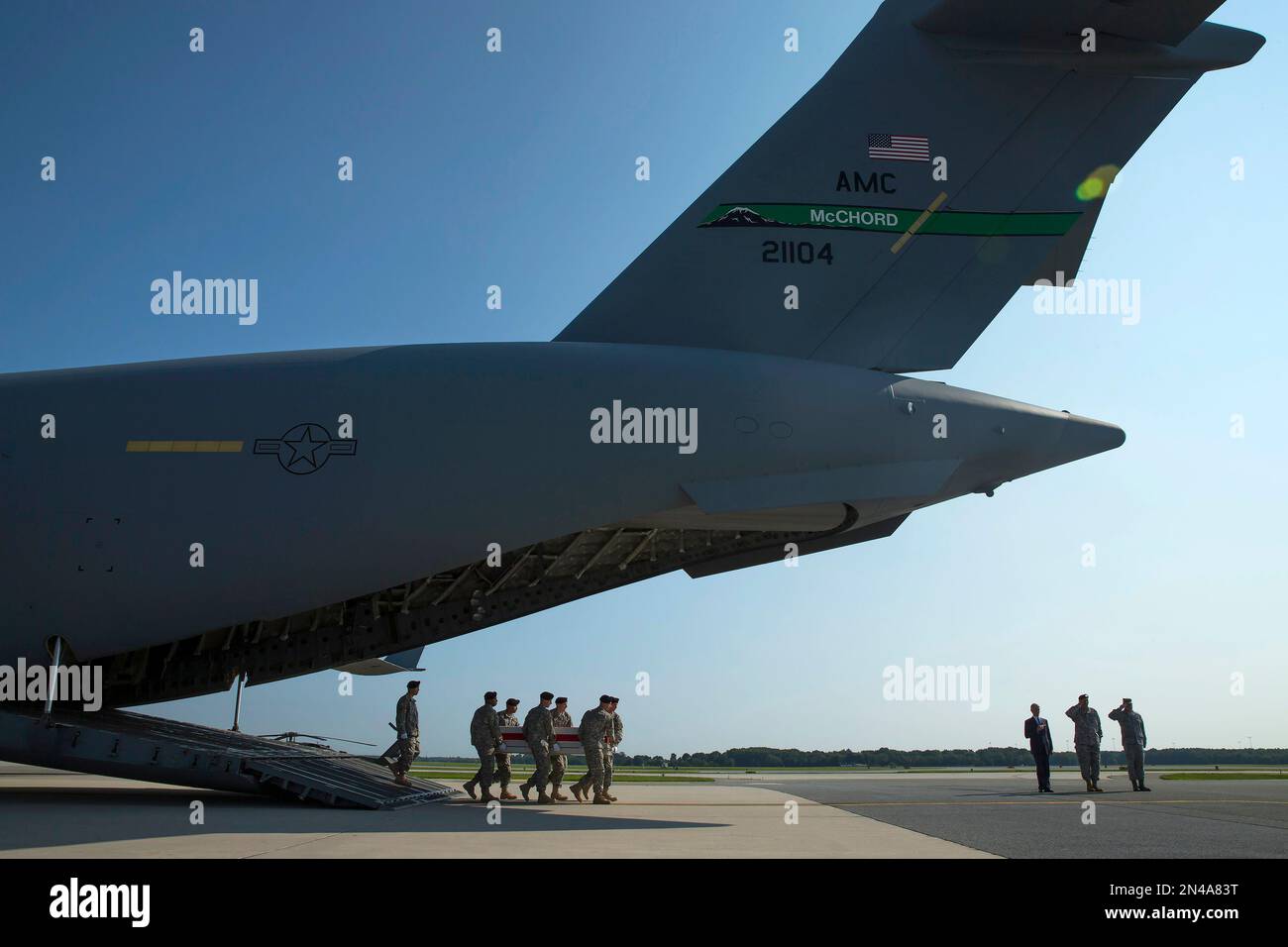 An Army carry team transfers the remains of Army Maj. Gen. Harold ...