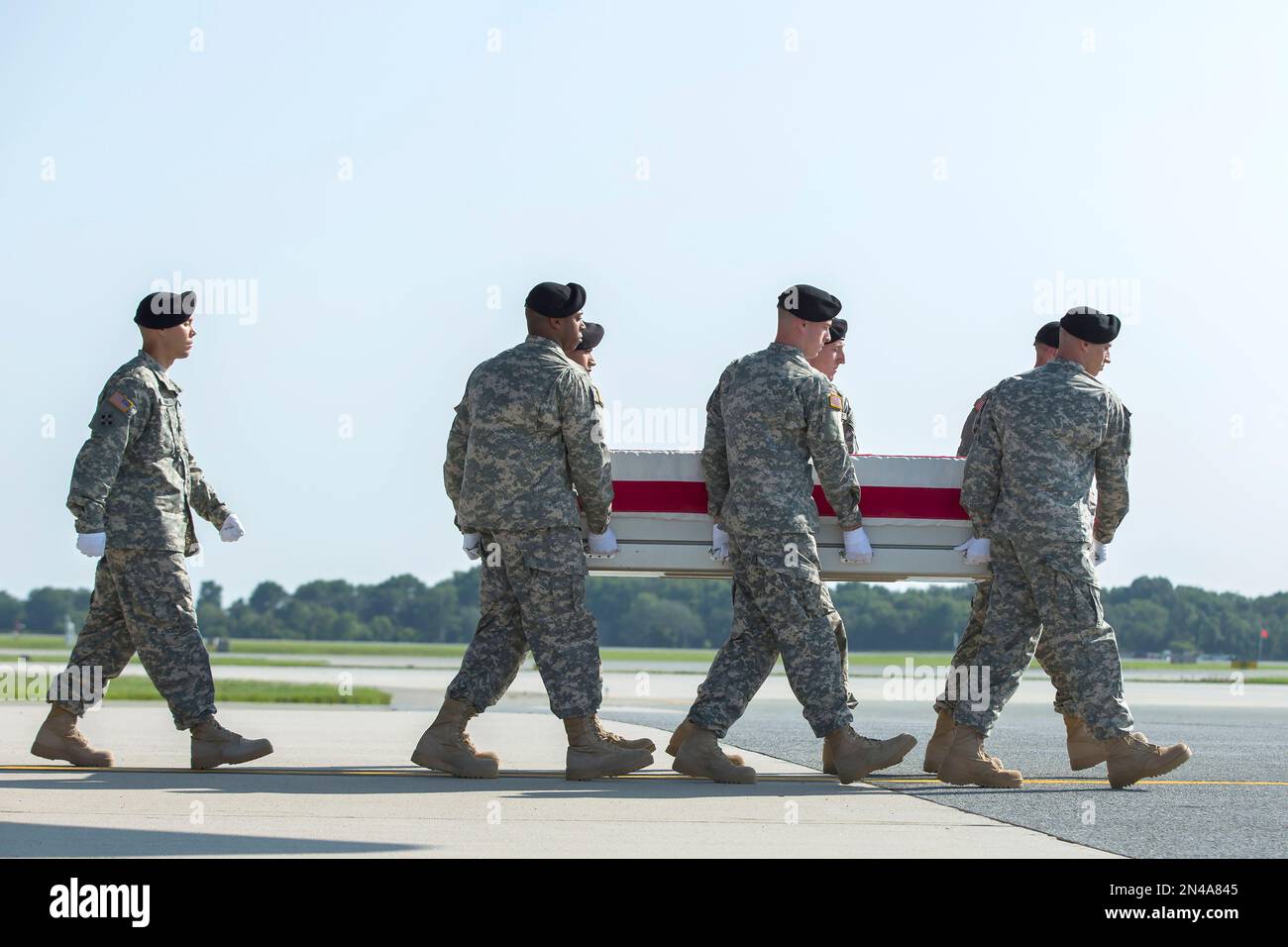 An Army carry team transfers the remains of Army Maj. Gen. Harold ...