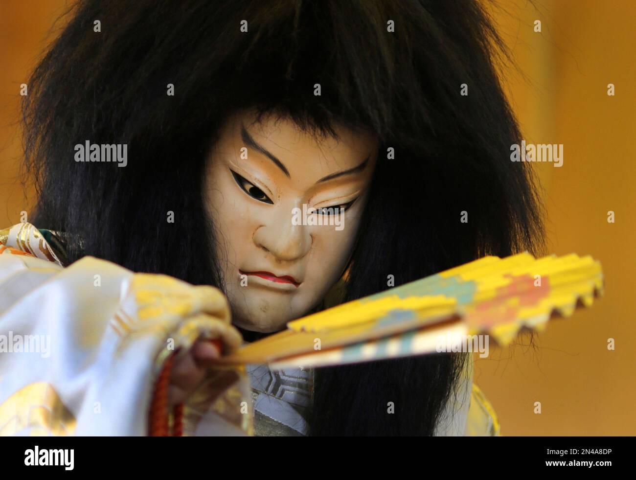 An artist performs a traditional Kagura or a scared dance dedicated to ...