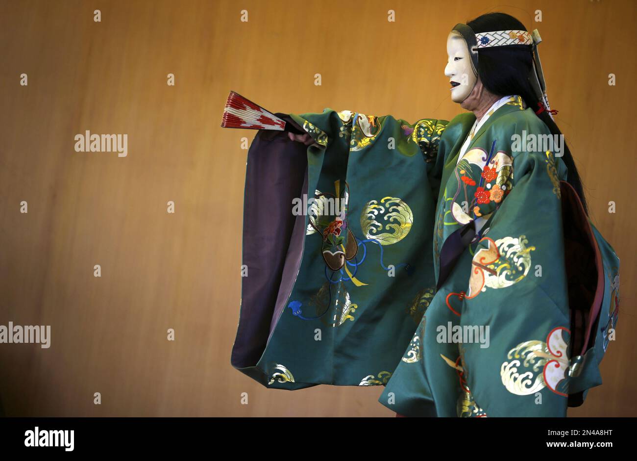 An artist performs a traditional Kagura or a scared dance dedicated to ...